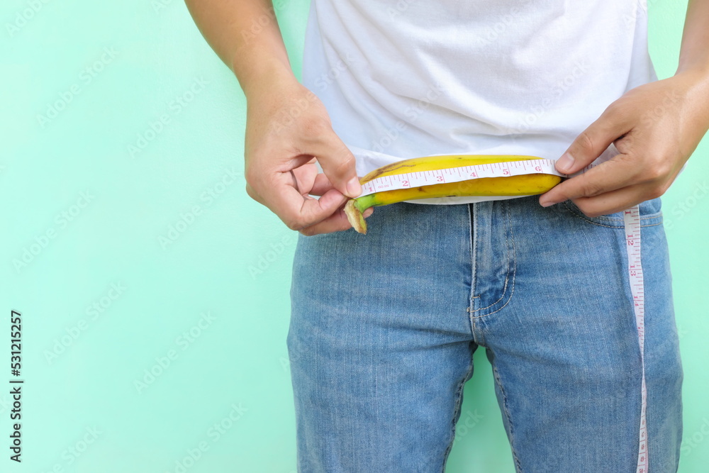 Size matters concept and penis size measurement. Young Asian man ... Size matters concept and penis size measurement. Young Asian man ...