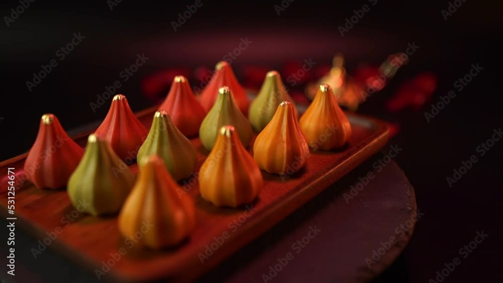 Ladu modaka dessert for Lord Ganesha on a tray ready to be worshiped ...