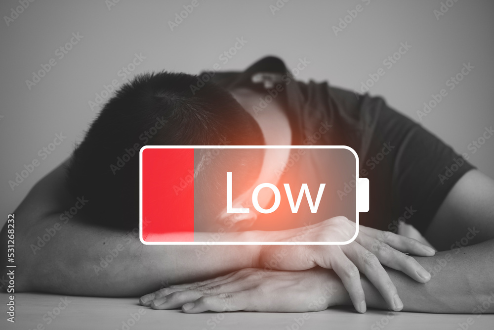 Businessman pressing button Low battery of energy with people icon ...