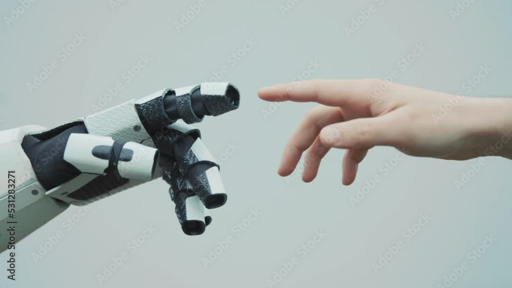 Robot hand and human hand touching each others on white background ...
