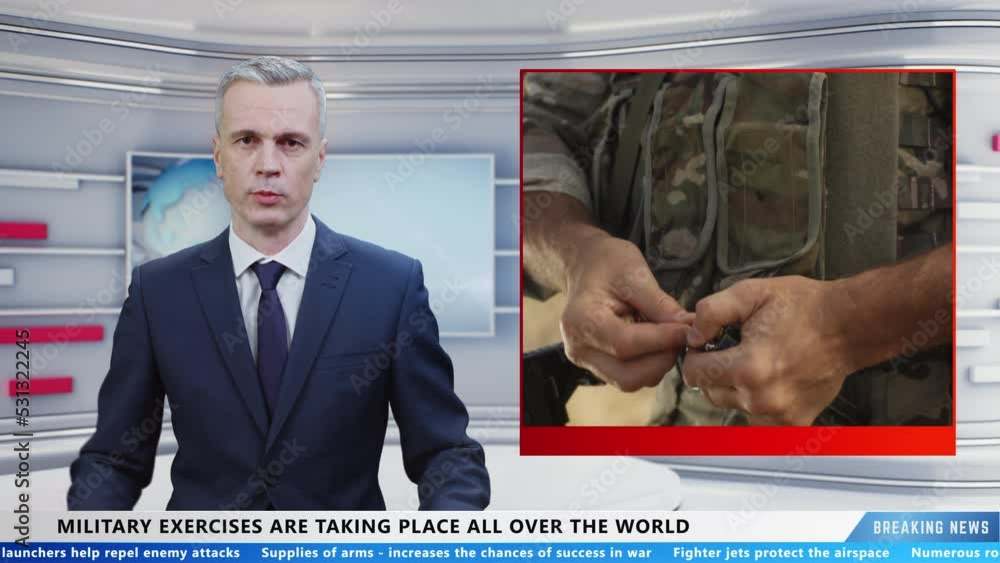 Male TV presenter reporting military news from TV studio in live news ...