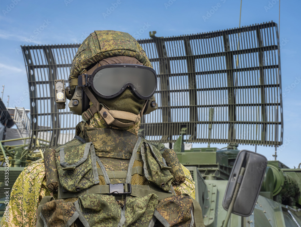 Military intelligence. Soldier mannequin in front of locator. Satellite ...