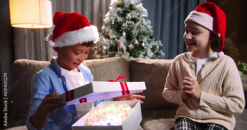 Happy cute children overjoyed with surprise, children exchange ...