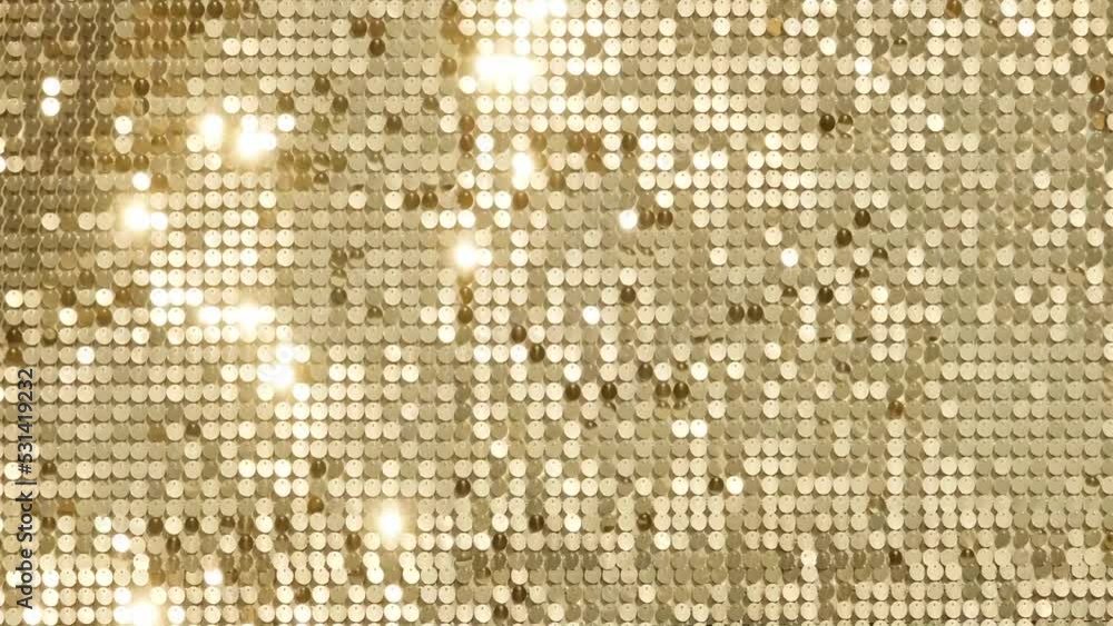 Video „rows of blinking golden yellow brass metal plaques sway in wind ...