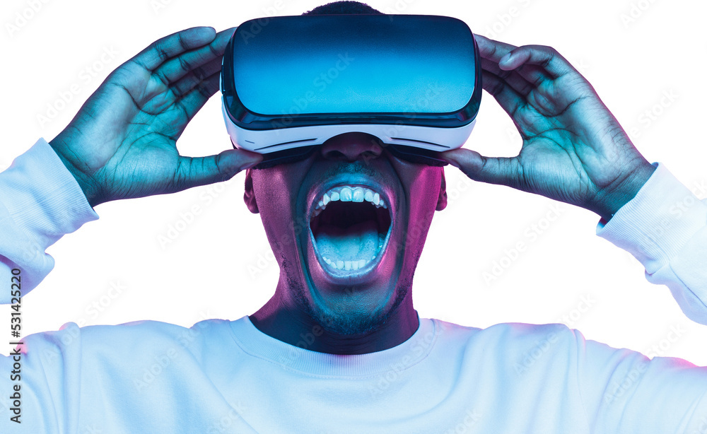 Excited shocked african man watching movie though VR glasses, scared by ...
