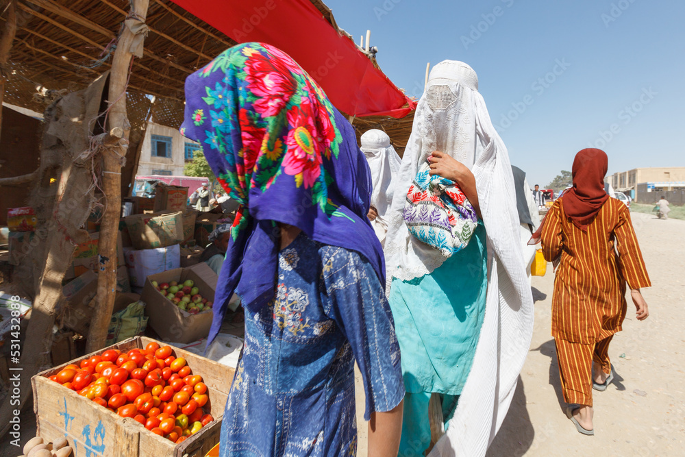 Afghan women wearing burka (burqa) at the market, Andkhoy, Faryab ...