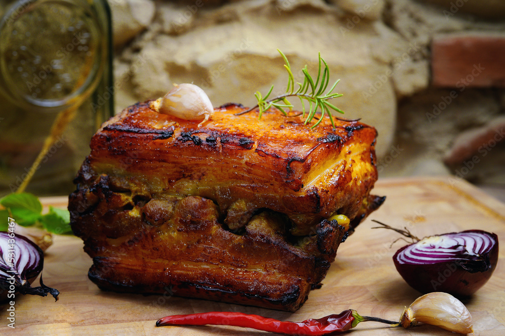 Roasted pork with garlic and turmeric. Beautiful background, homemade ...