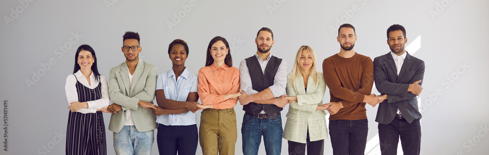 Portrait of successful group of business people standing together in ...