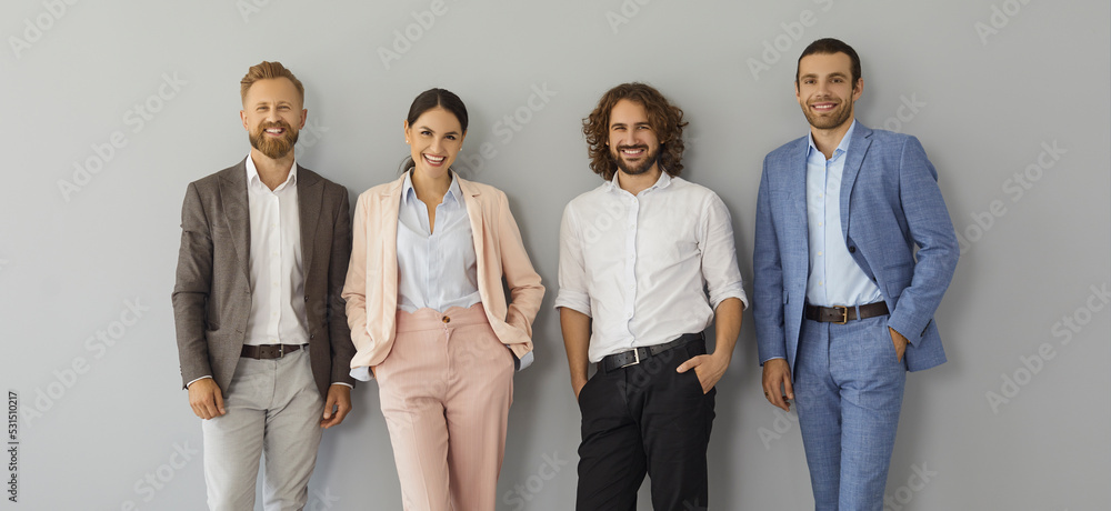Banner with group portrait of four successful stylish young business ...