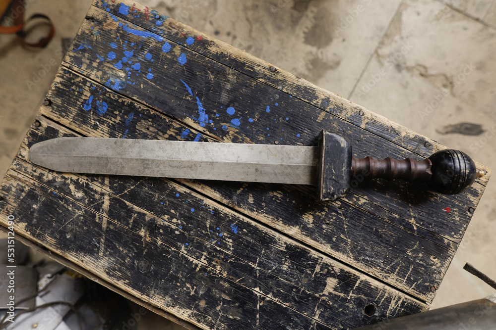 Details with an ancient Roman soldier's sword (gladius) during a ...