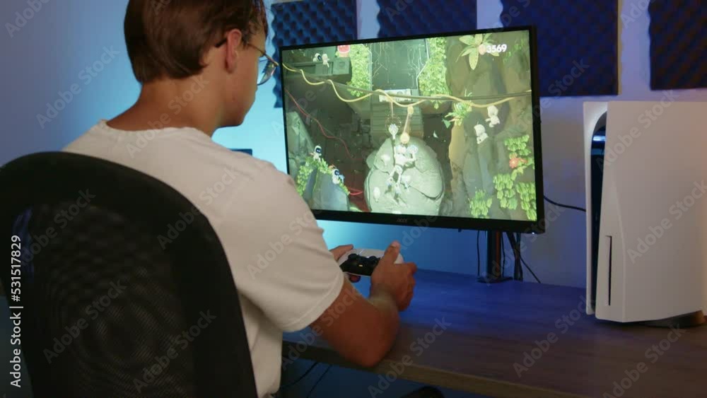 Boy Laying down his PS5 controller and walking away after gaming on his ...