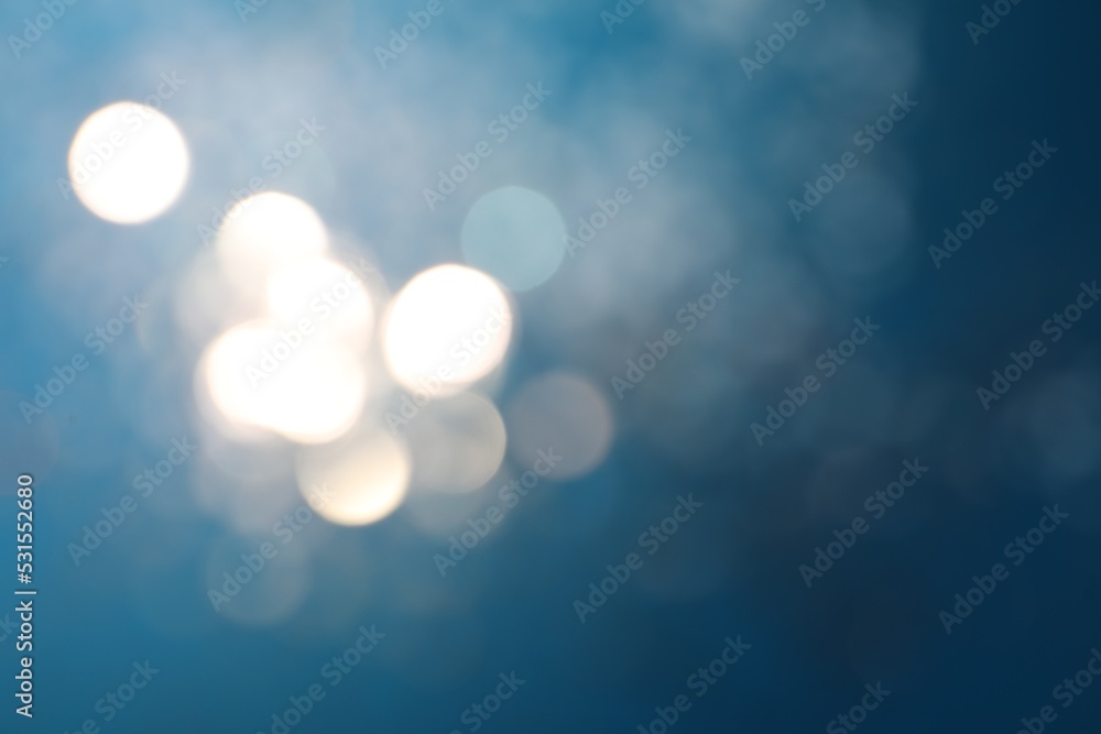Shiny blue background with magical bokeh effect Stock Photo | Adobe Stock
