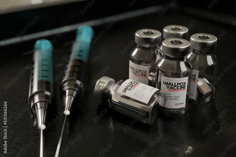 Monkeypox and smallpox vaccine ampoule, sided by a blue transparent ...