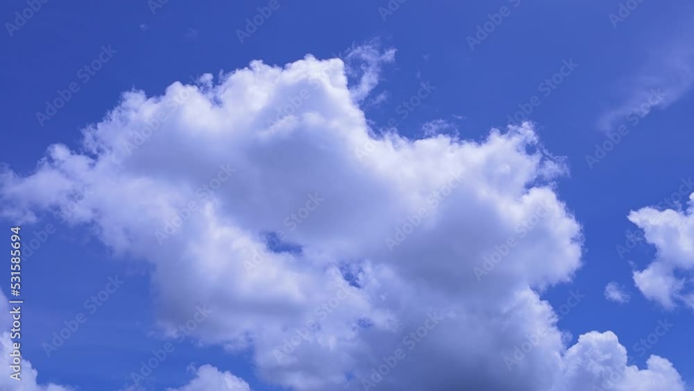 white clouds circle the blue sky aerial view The sky is clear and ...