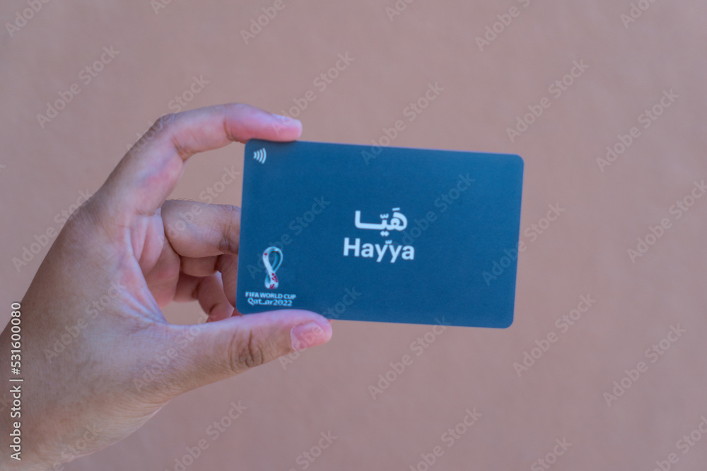 Doha, Qatar - September 18, 2022: Girl hand holding Hayya Card which is ...