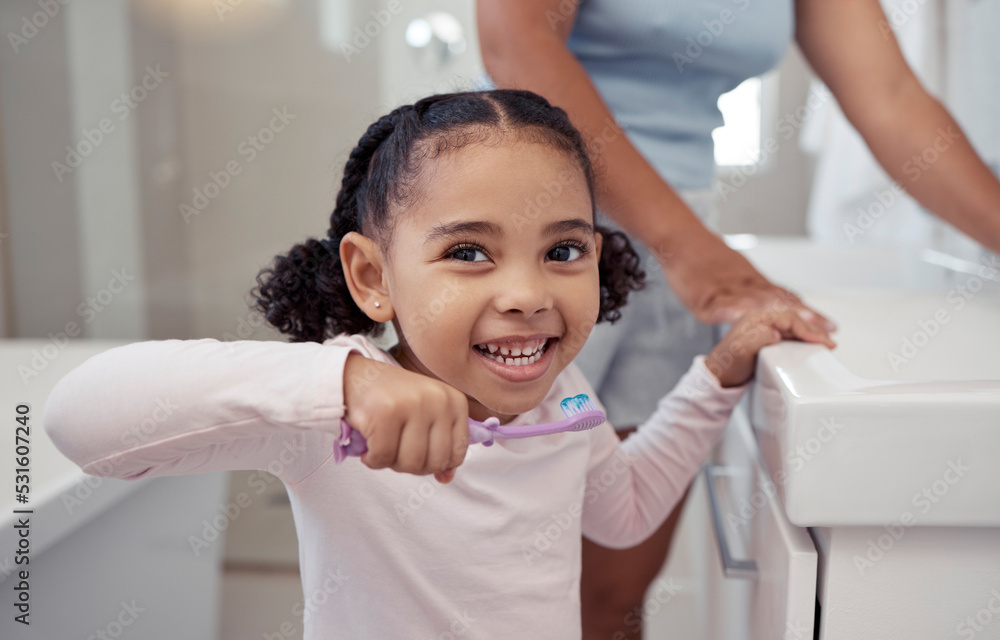 Children, toothbrush and toothpaste with a girl brushing teeth in the ...