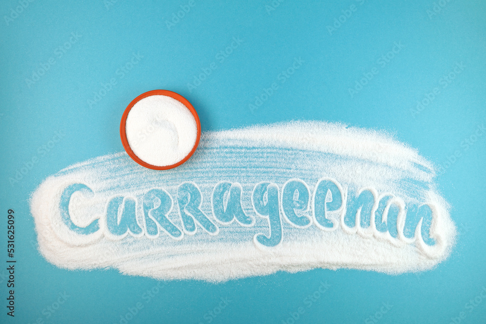 Inscription Carrageenan of Carrageenan Gum Powder on blue background ...