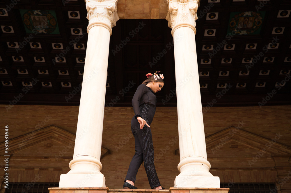 Beautiful teenage flamenco dancer with brown hair and dressed in dance ...