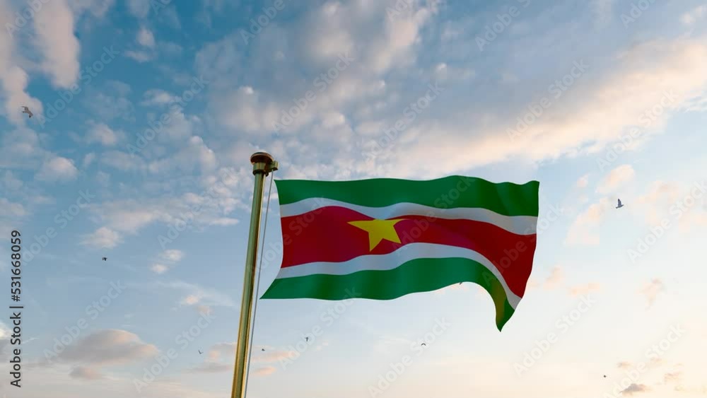 Flag of Suriname waving in the wind, sky and sun background. Surinam ...