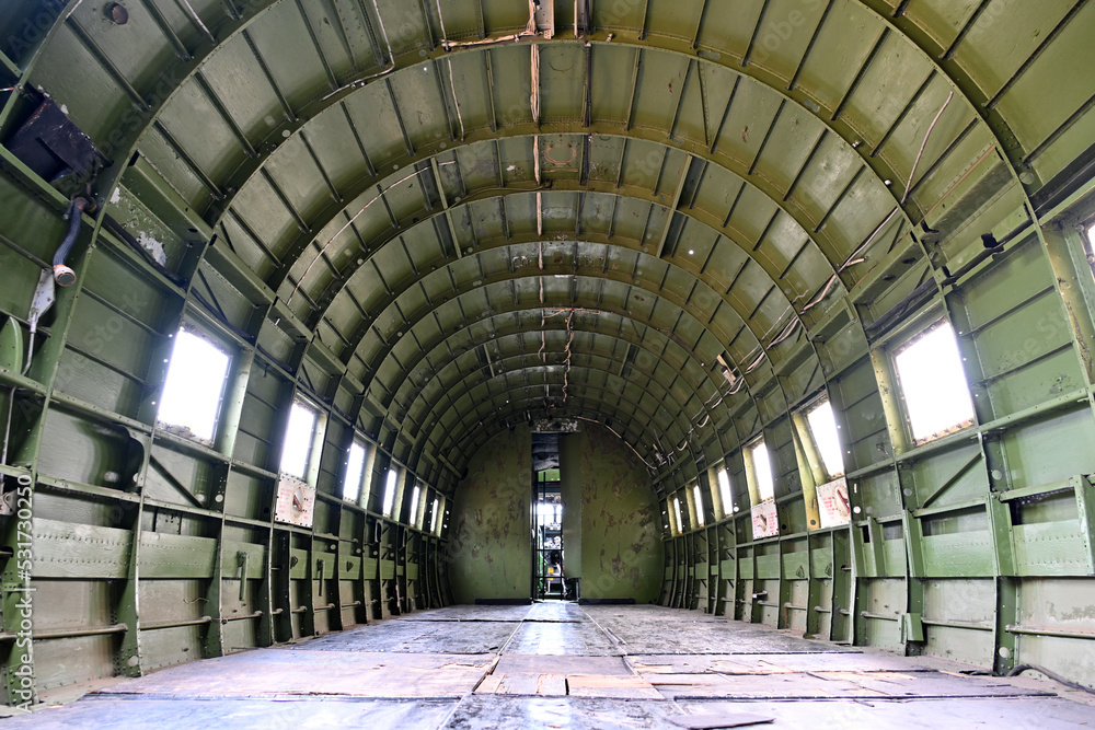 Foto de Fuselage of the inside of a military green plane during the war ...