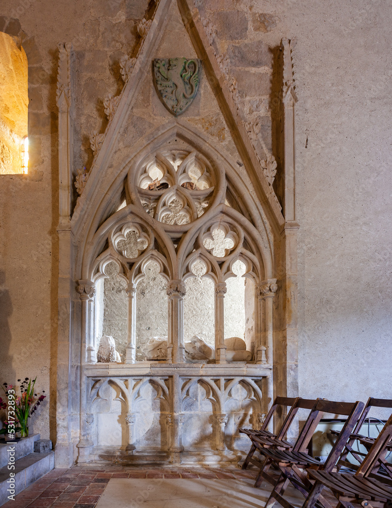 Gothic crypt with the effigy of a knight of the 14th century. This ...