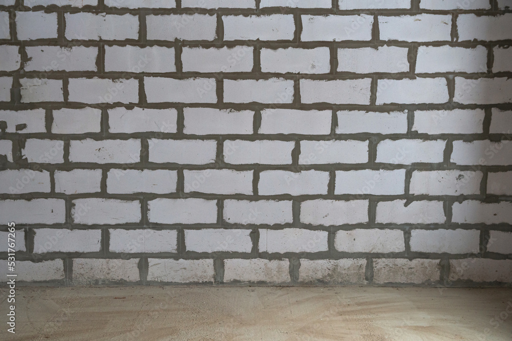 the inner wall of a country cottage. the wall is made of aerated ...