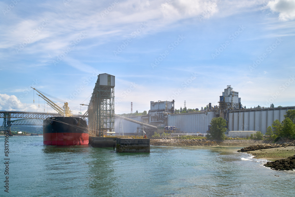 Loading Grain Cargo Ship Vancouver. A freighter is loaded with grain at ...