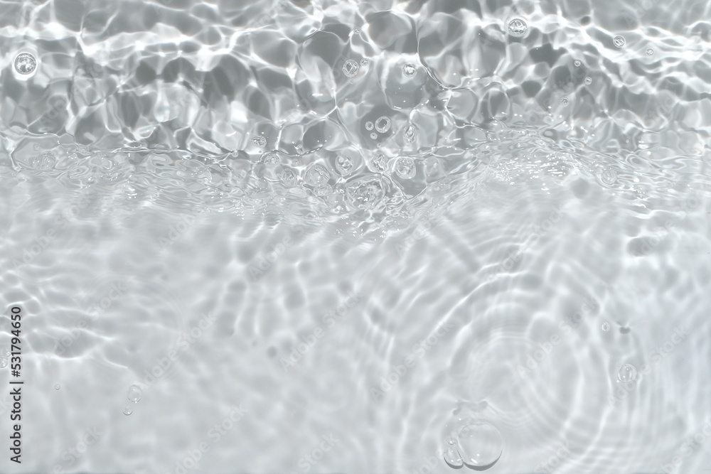 Transparent clear calm water surface texture with waves, splashes and ...