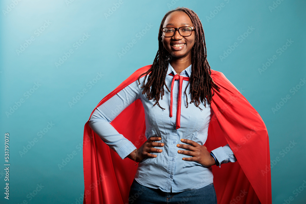 Proud superhero woman with superpower abilities wearing mighty hero ...