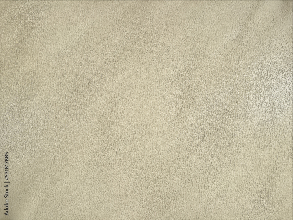 Beige suede leather showing fine dimpled texture and irregular colour ...