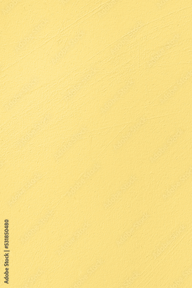Light pastel yellow colored low contrast Concrete textured background ...