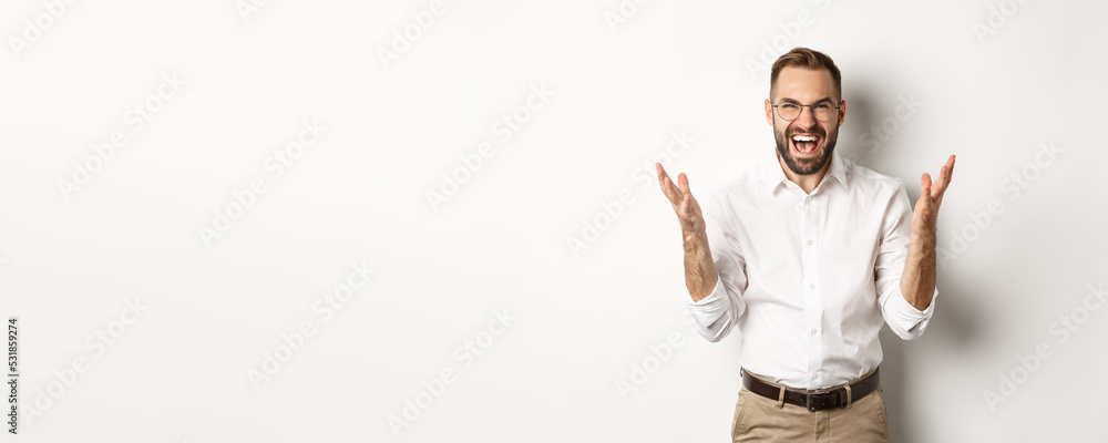 Frustrated and angry man screaming in rage, shaking hands furious ...