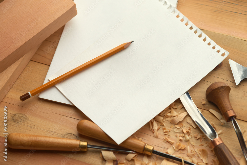 Mockup blank sheet of paper with a pencil on wooden craftsman desk ...