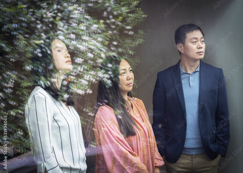 Business people looking out window with reflection Stock Photo | Adobe ...