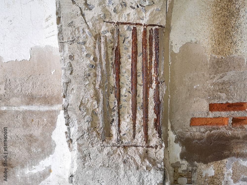 Rusty steel inside concrete columns.Broken building structure. Stock ...