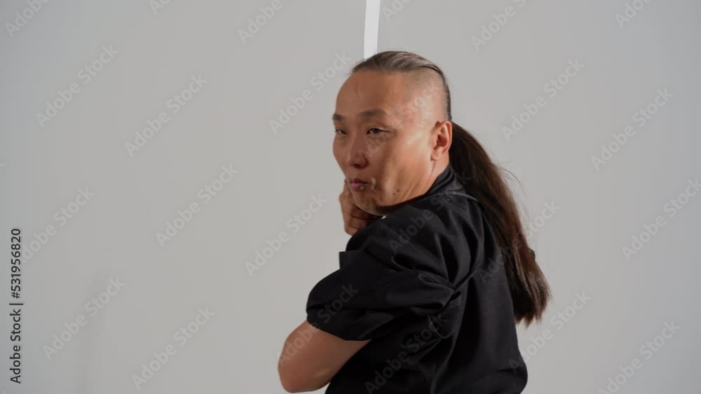 Japanese man traditional dress, black kimano katana samurai sword ...