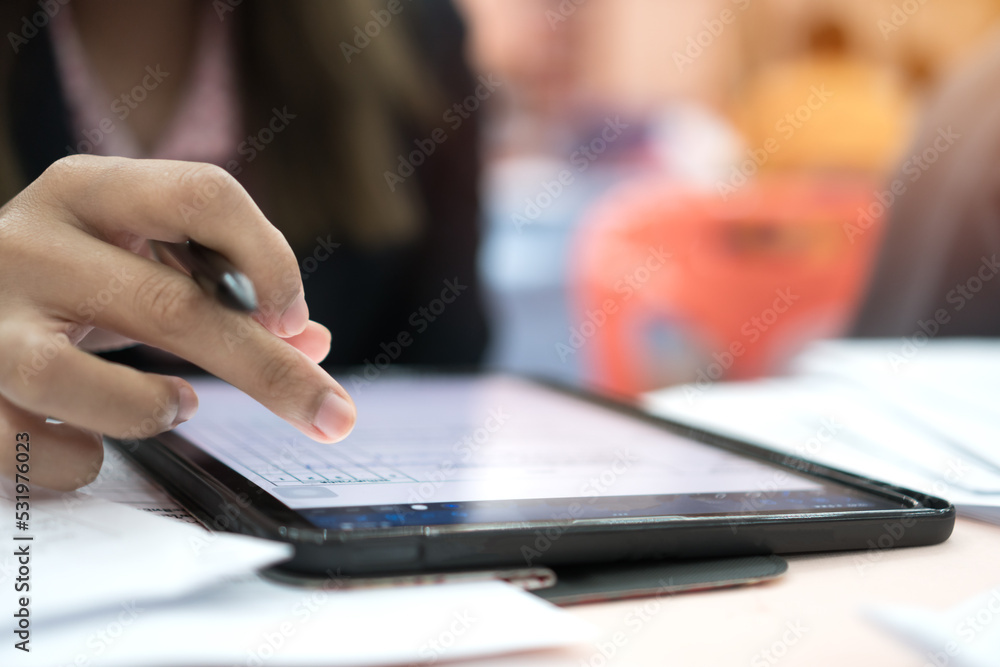 Asian Woman Teacher using Finger touching gadget choose app on ...