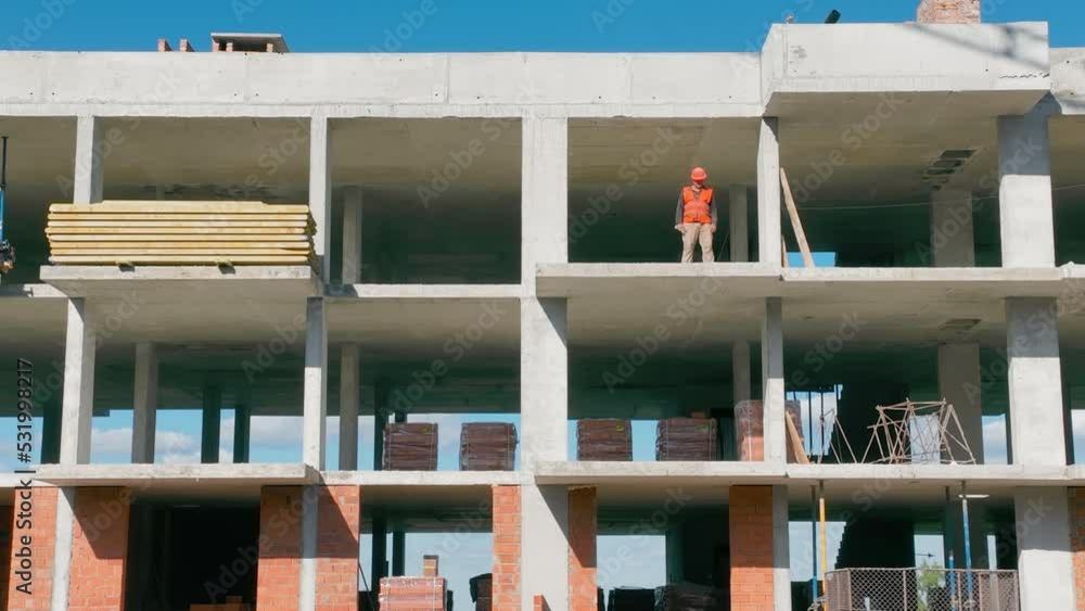 Aerial view of the construction of a monolithic multi-story building ...