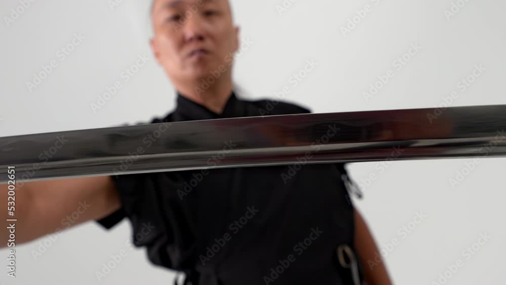 Japanese, black traditional kimano samurai, wars, touches sheath katana ...