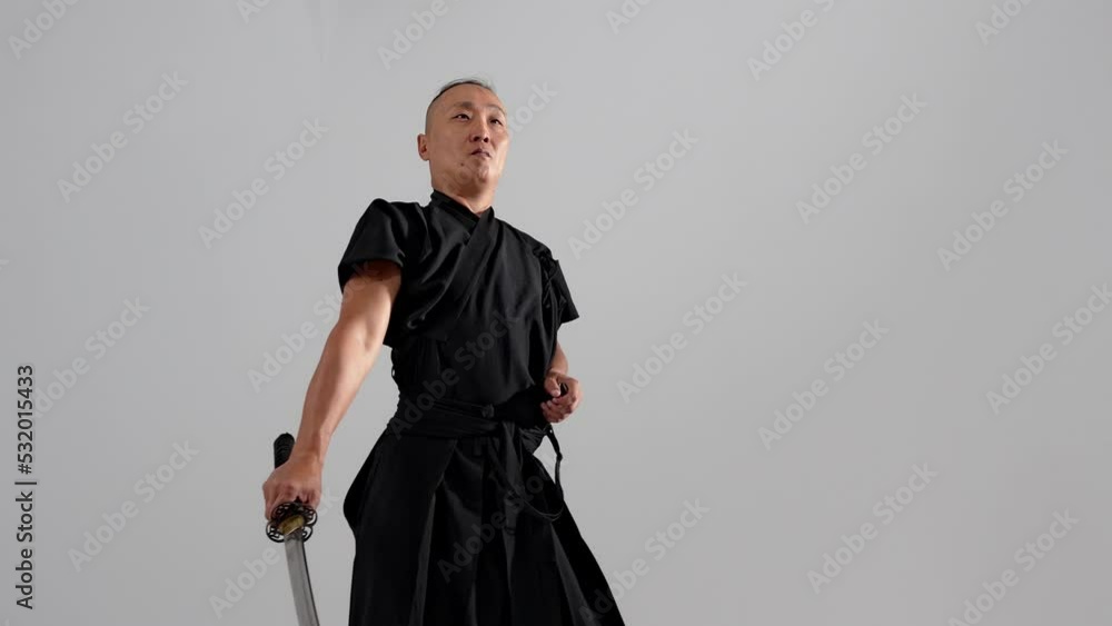 Japanese man traditional dress, black kimano katana samurai sword ...