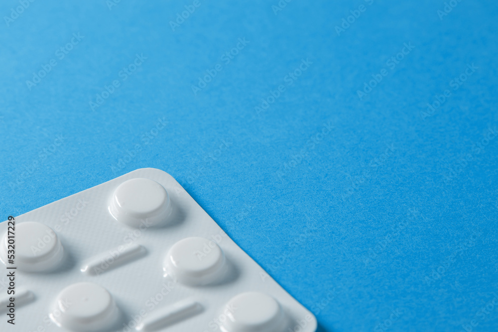 Blue medical background with pill packaging and free space for text ...