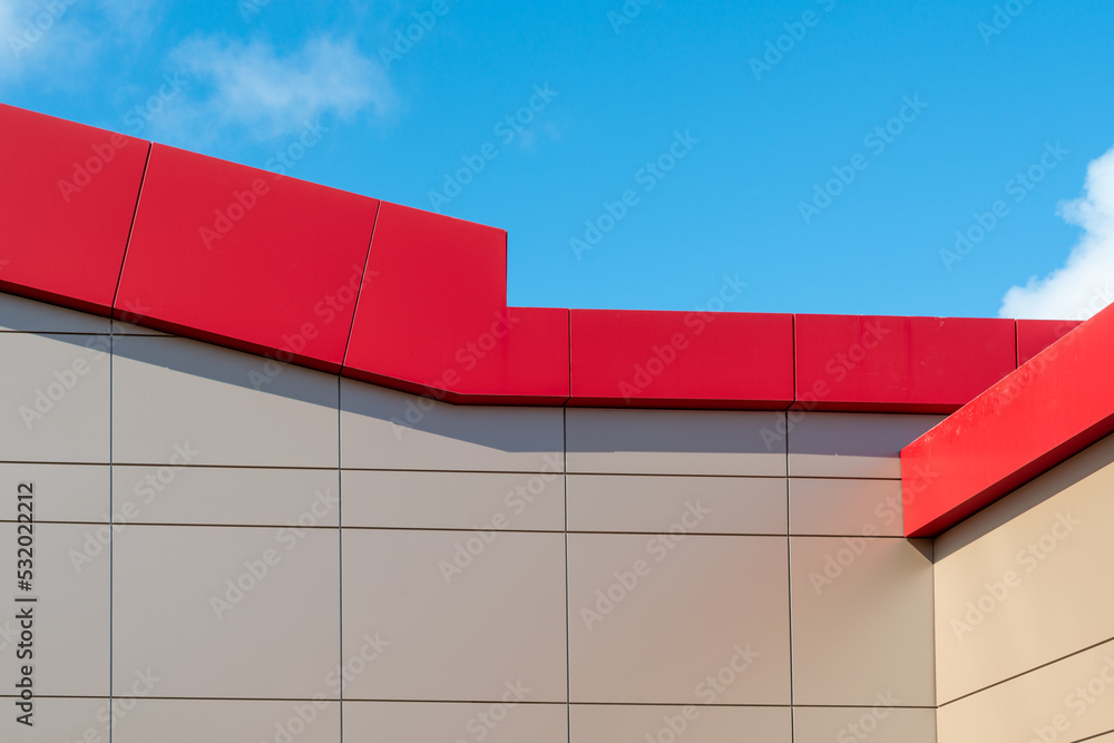 The exterior wall of a contemporary commercial style building with ...