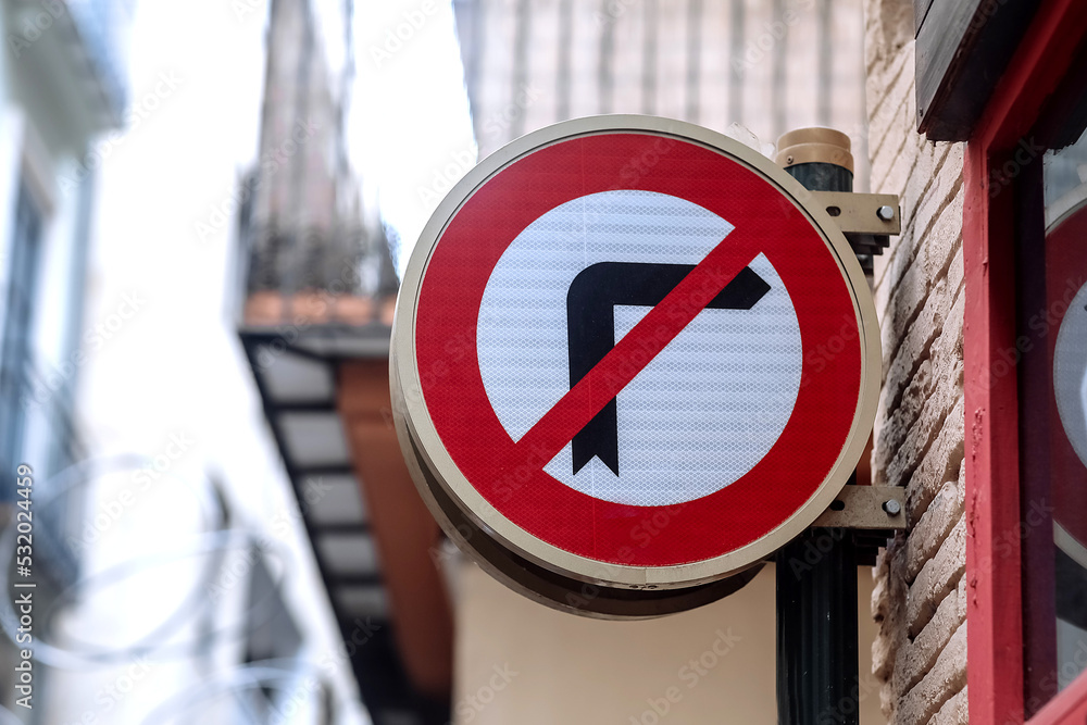 Traffic sign indicating and prohibited turning right in town. Road ...