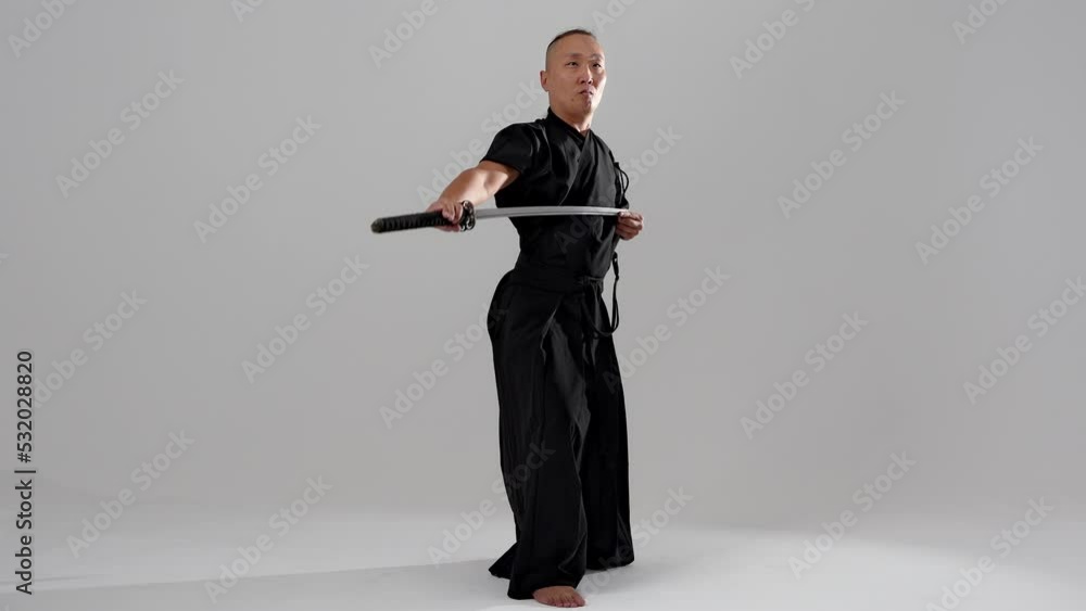 Japanese man traditional dress, black kimano katana samurai sword ...