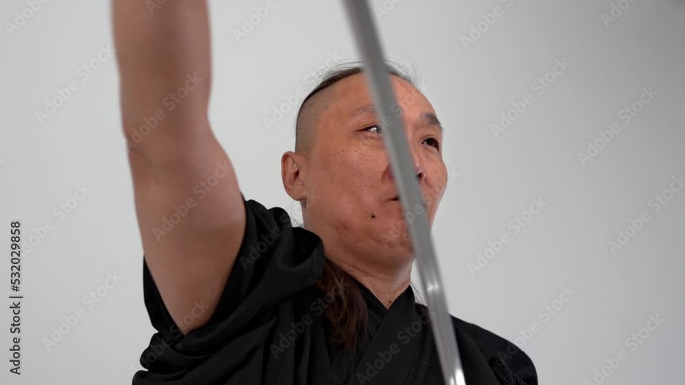 Japanese man traditional dress, black kimano katana samurai sword ...