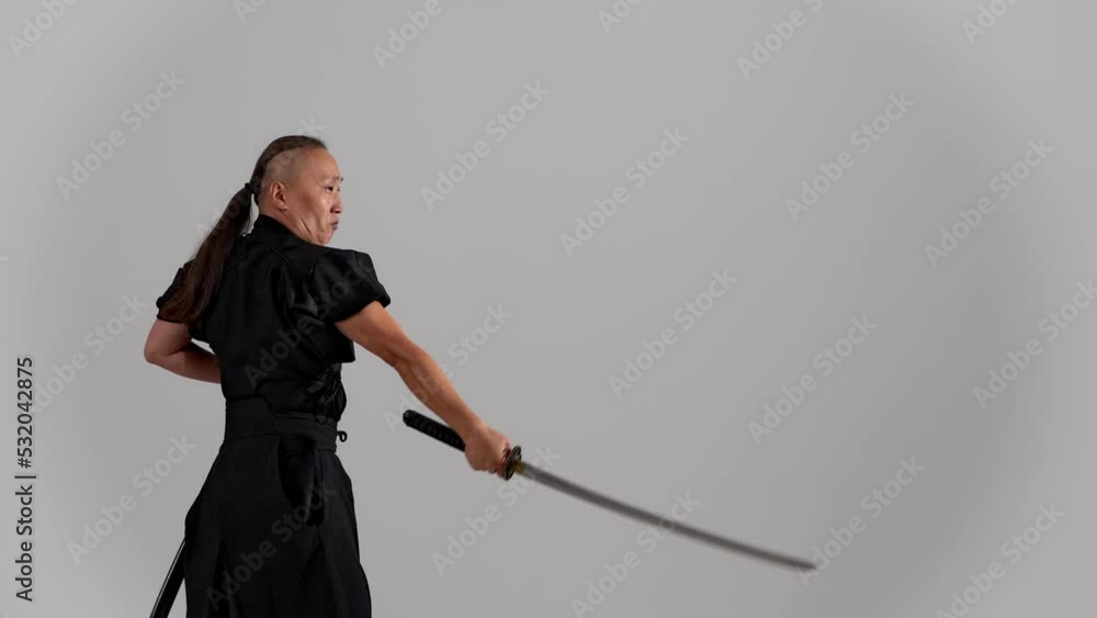 Japanese man traditional dress, black kimano katana samurai sword ...