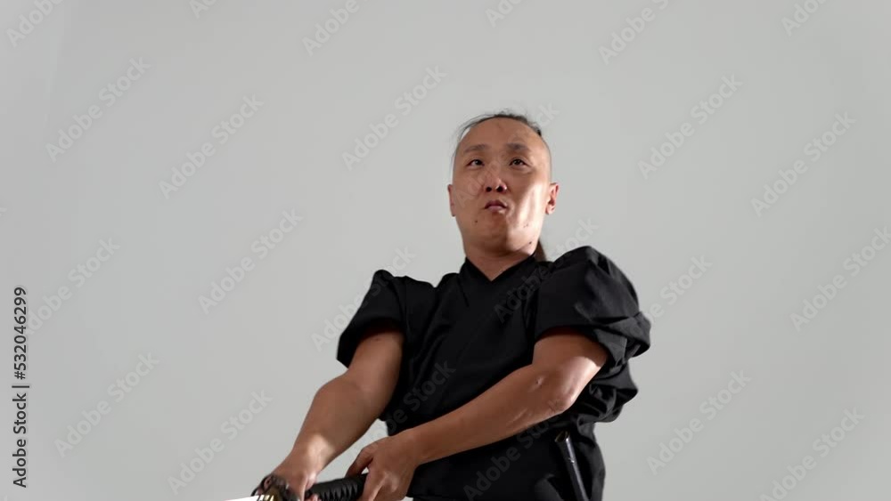Japanese man traditional dress, black kimano katana samurai sword ...