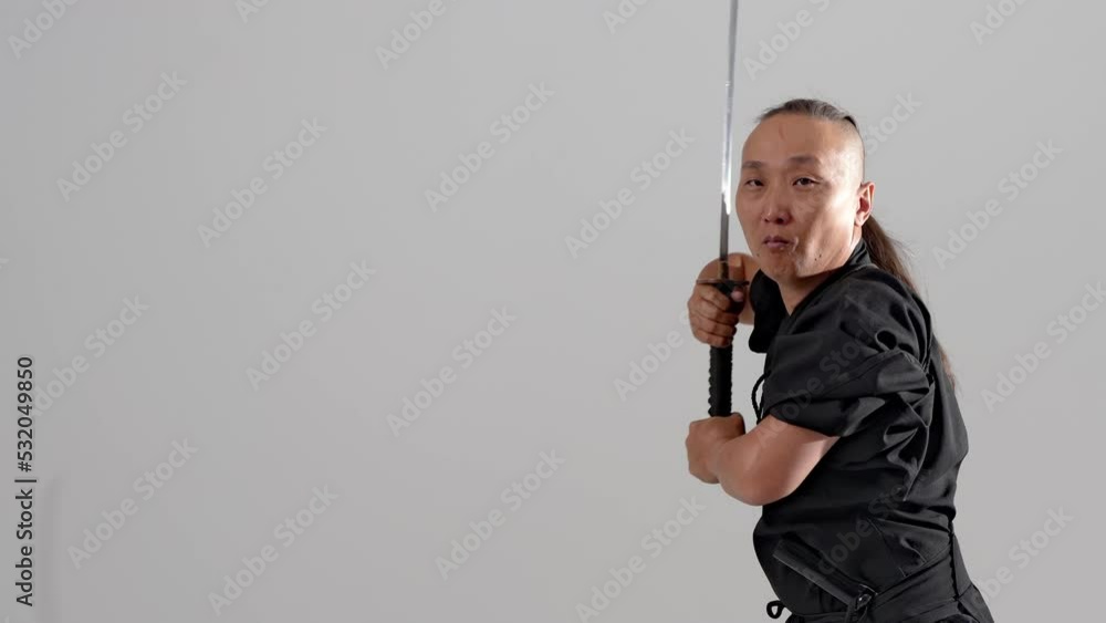 Japanese man traditional dress, black kimano katana samurai sword ...