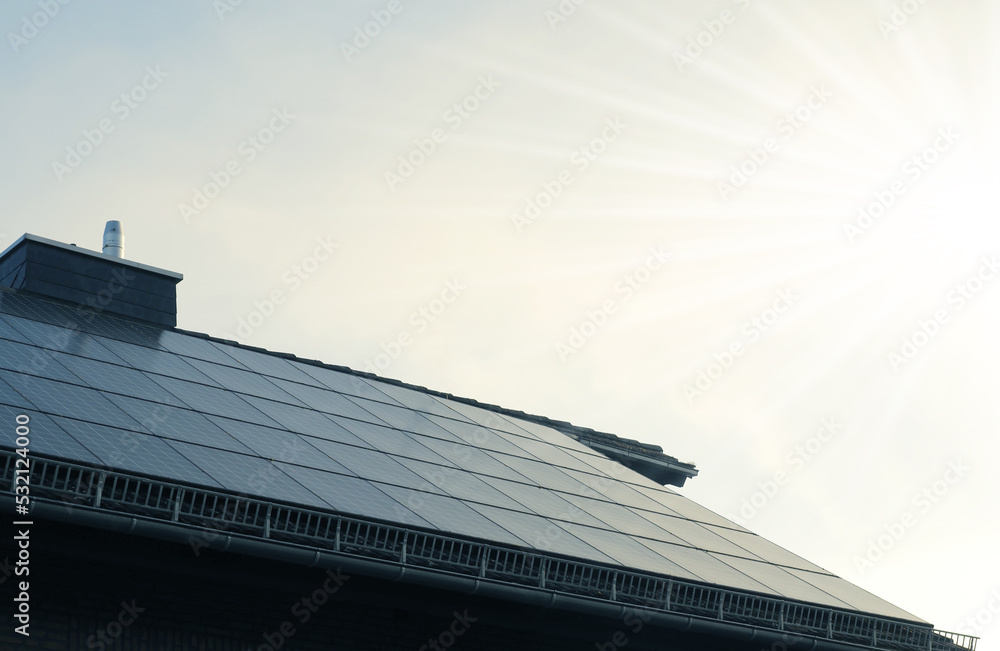 Solar panels on a roof, alternative energy, zero emission, sun power ...