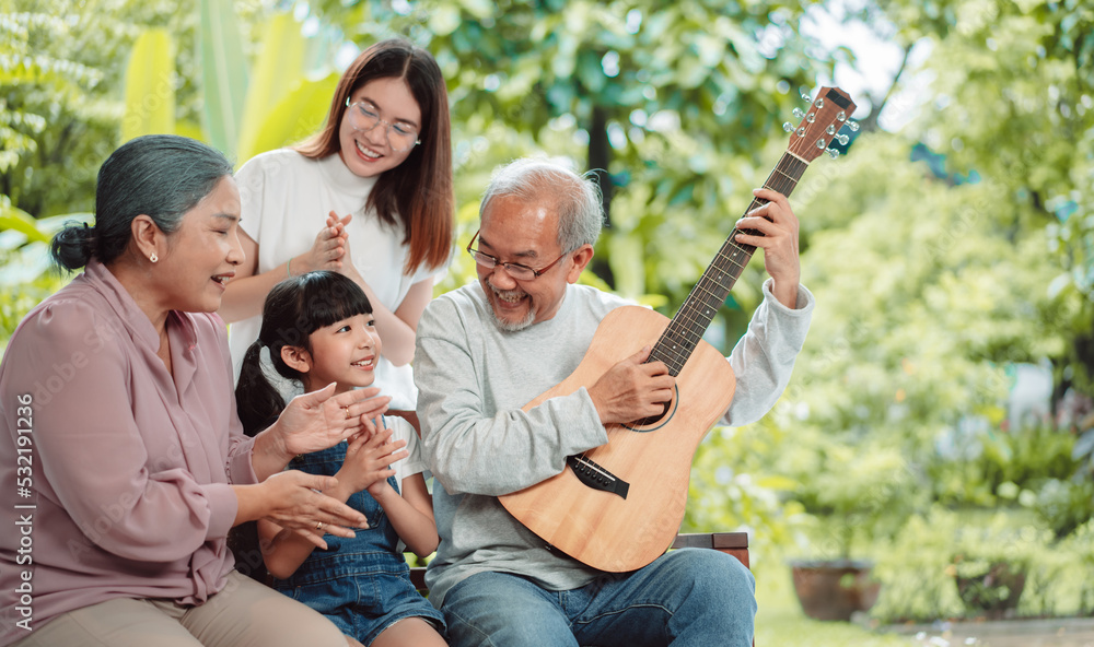 Asian happy family smiling stay home outside .backyard. Little girl ...